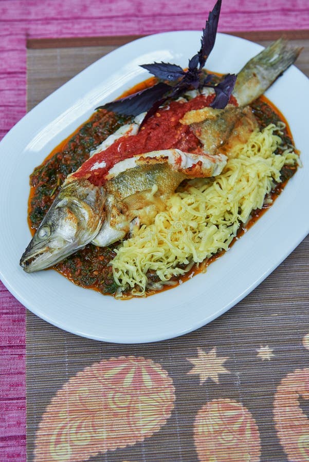 Fried Fish Pike-perch Sliced Well Fried with Garnish Pomegranate Sauce ...