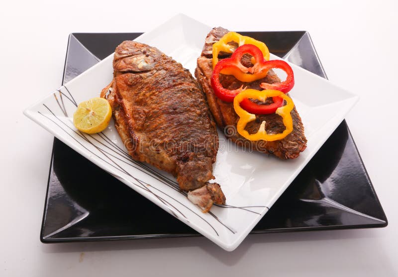 Fried fish plate stock image. Image of prepared, cooking - 106558403