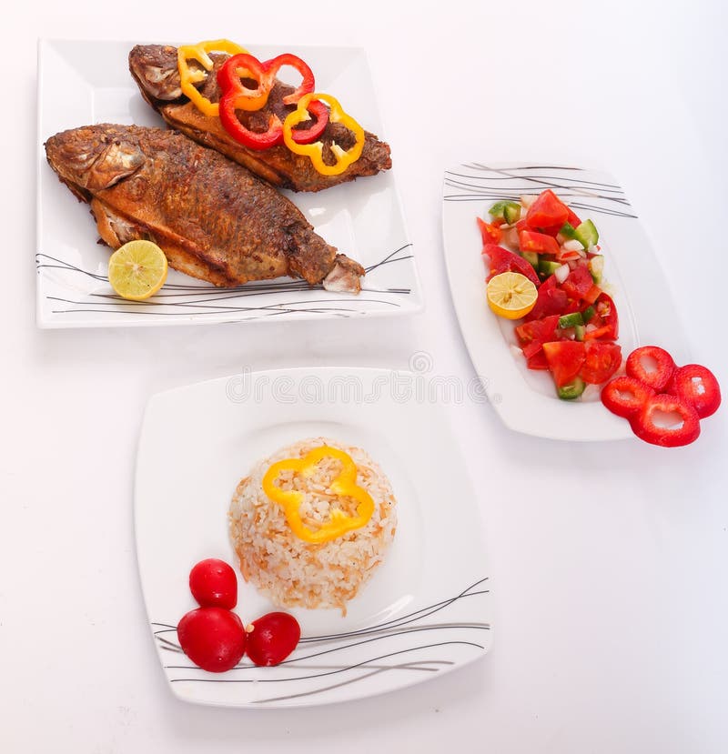Fried fish plate with rice stock image. Image of dark - 106557765