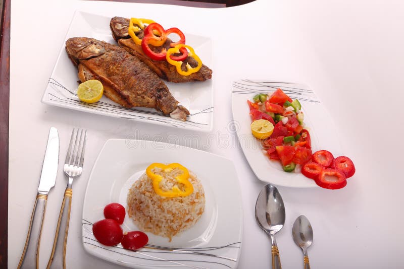 Fried fish plate with rice stock photo. Image of bowl - 106796092