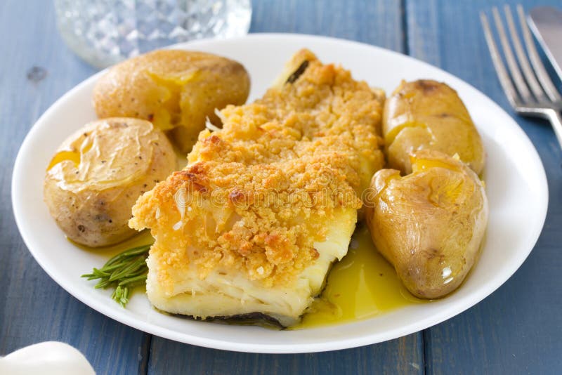 Fried Fish with Potato and Oil on Dish and Glass Stock Image - Image of ...