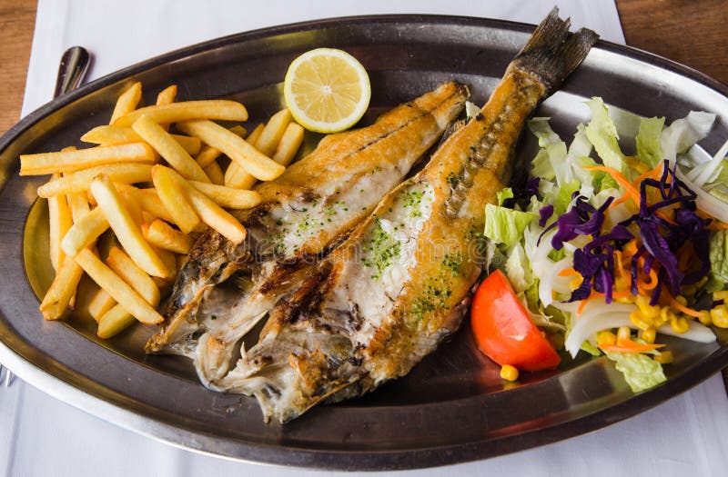 Fried Fish with Potato and Salad Stock Image - Image of fresh, rosemary ...