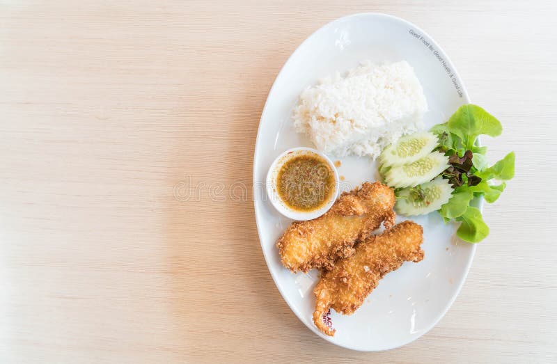 Fried fish with rice stock photo. Image of mojarra, lunch - 87567302