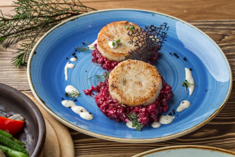 Fried Fish Rissole Served with Beetroot on Blue Plate on Wooden Table ...