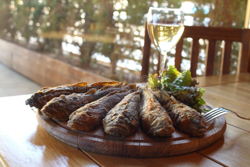 Fried Bull Testicles with Potatoes and Mushroom Sauce Stock Image ...