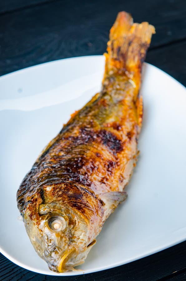 The Fried Fish Served on the Plate Stock Photo - Image of fresh, lunch ...