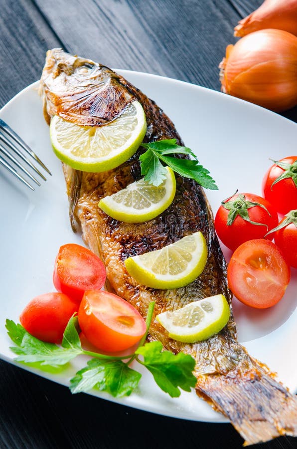 The Fried Fish Served on the Plate Stock Photo - Image of fried, food ...