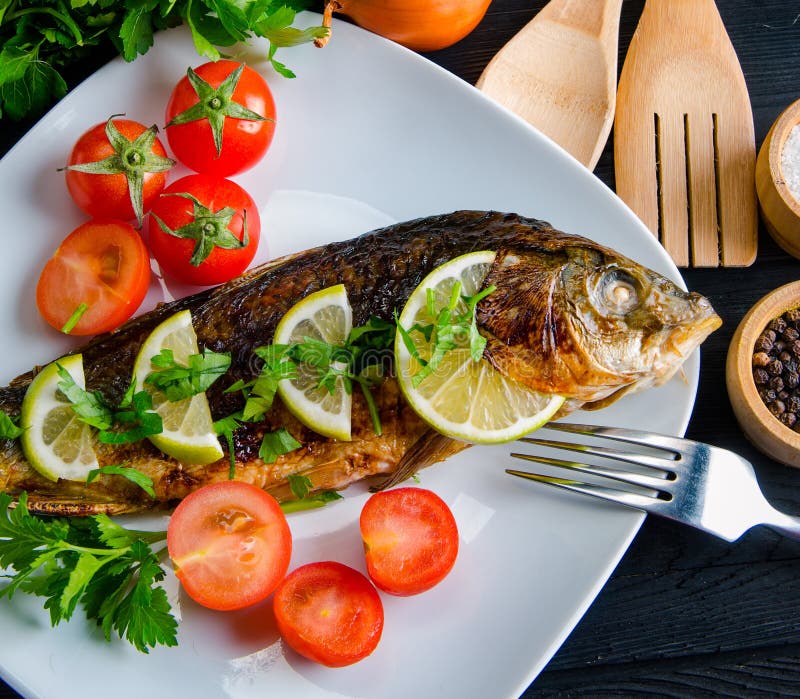 Fried Fish Served on the Plate Stock Photo - Image of appetizing ...