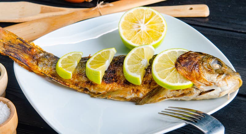 The Fried Fish Served on the Plate Stock Image - Image of fish, dish ...