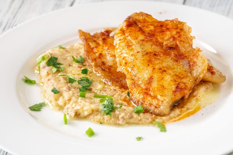 Fried fish with skordalia stock image. Image of wooden - 274214933