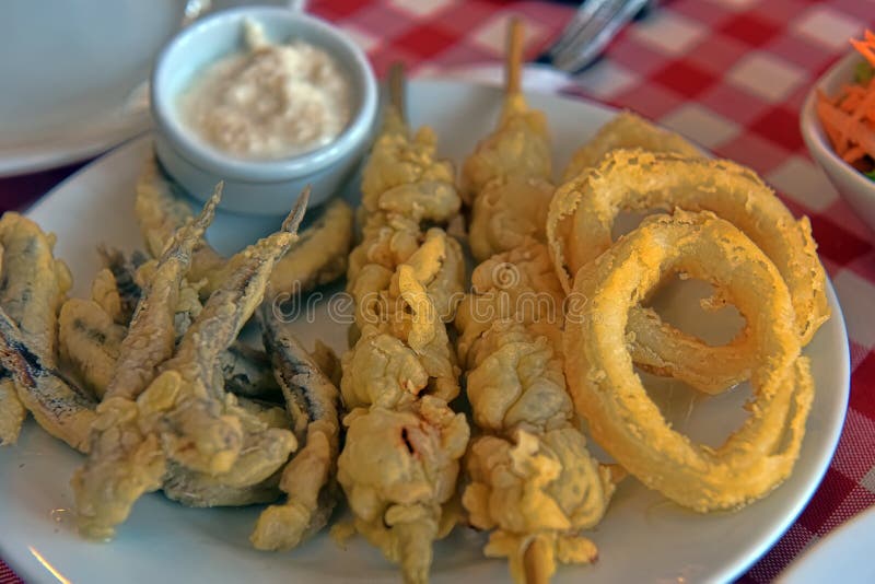 Fried fish and squid rings stock image. Image of fresh - 123427461