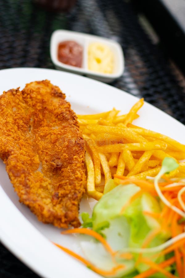 Fried Fish Steak stock image. Image of dining, plate - 216141667