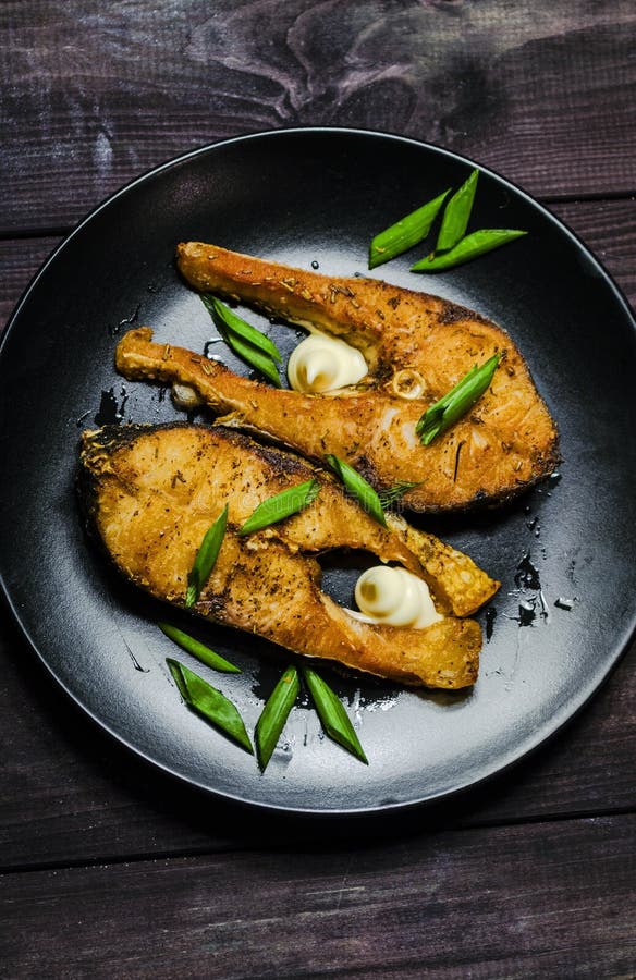 Fried fish steaks stock image. Image of healthy, garnish - 113597471
