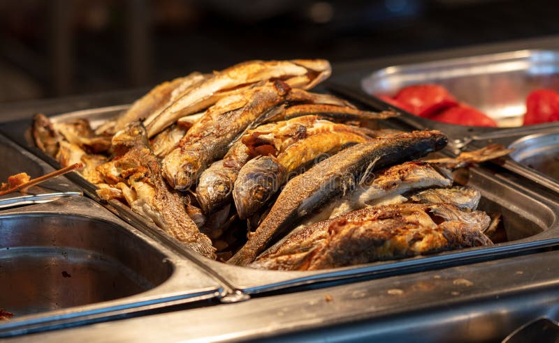 Fried Fish on a Tray in a Restaurant Stock Photo - Image of white ...