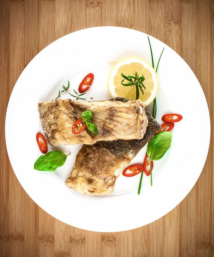 Fried Fish on White Plate, Top View Stock Photo - Image of green, fish ...