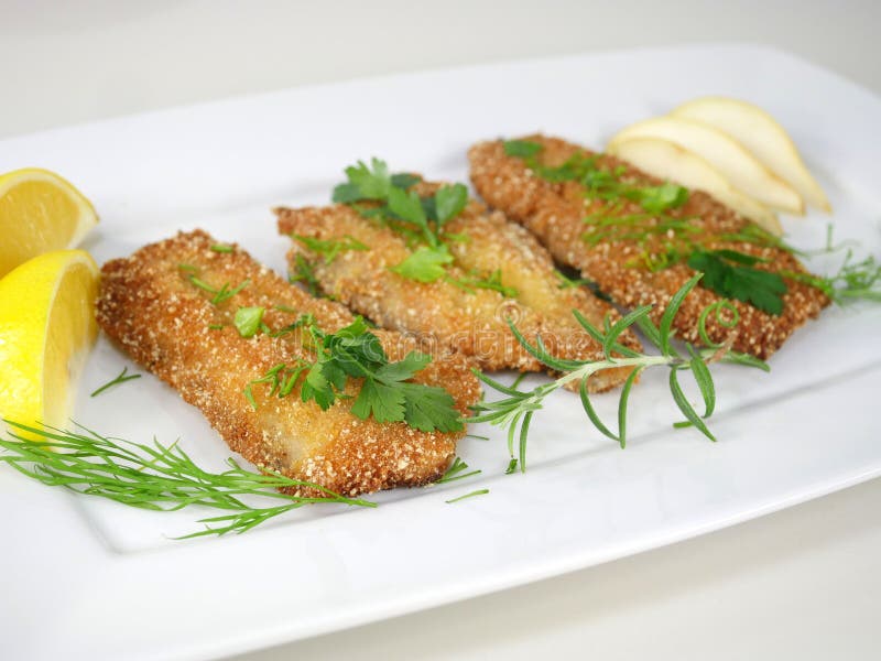 Fried Fishes Herrings on Plate Stock Photo - Image of deep, lettuce ...