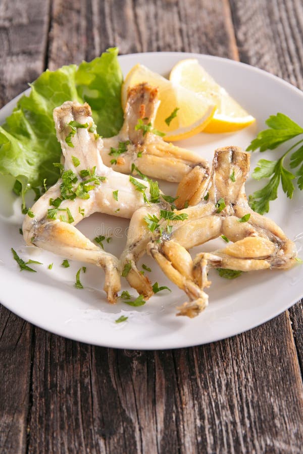 Fried frog stock image. Image of speciality, herb, wood - 46459349