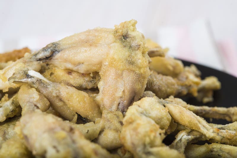 Fried frog legs. stock photo. Image of food, meat, traditional - 7719254