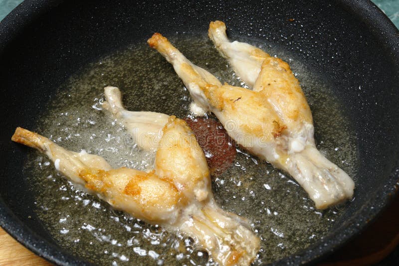 Fried frog thighs stock photo. Image of board, roast - 41135978