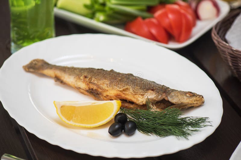 Fried grayling fish stock image. Image of tasty, traditional - 297968583
