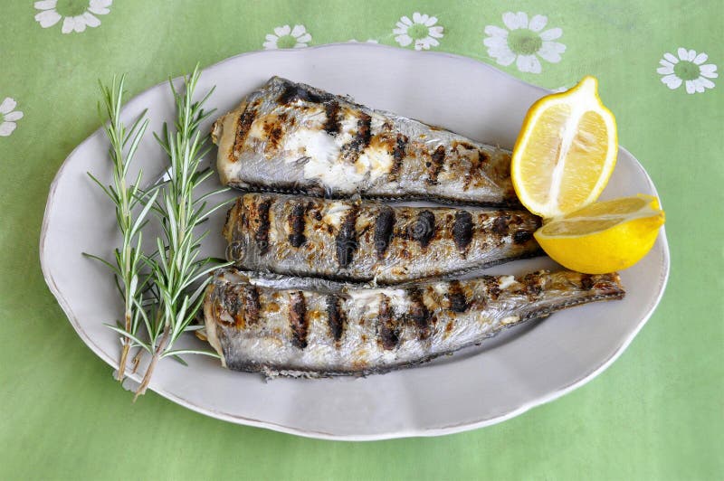 Fried Grilled Fish in White Tartle with Lemon. Stock Image - Image of ...
