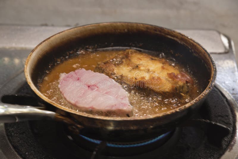 Preparing Fried Grouper Fish in the Kitchen Stock Image - Image of iron ...