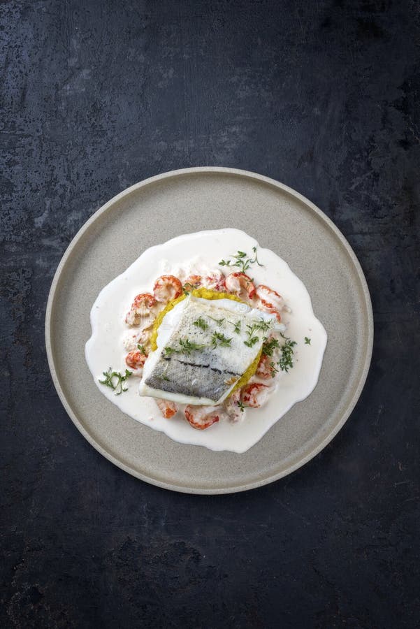 Fried Haddock Filet with Saffron Rice and Shell Prawns in Crab Sauce ...