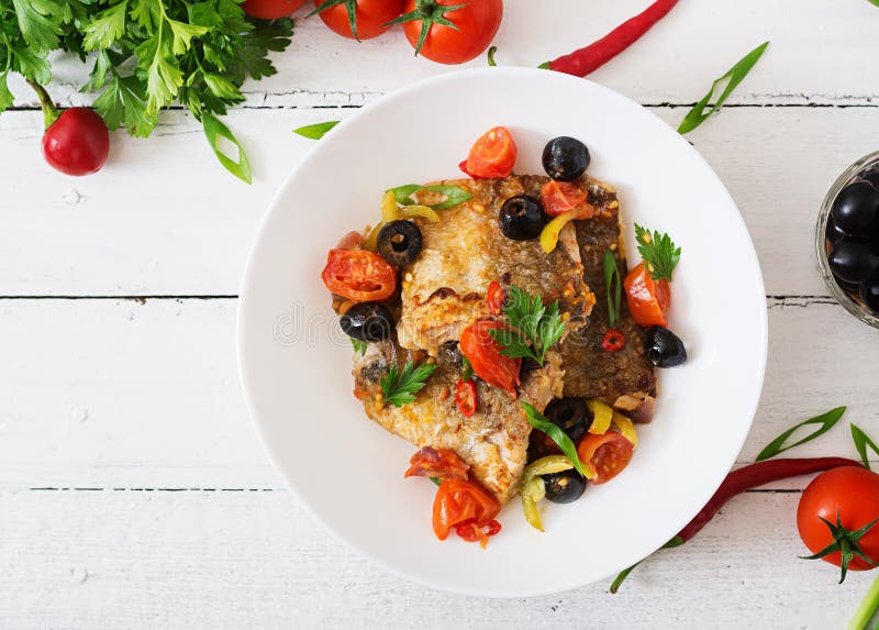 Fried Hake Fillet with Tomato and Olives Stock Image - Image of ...