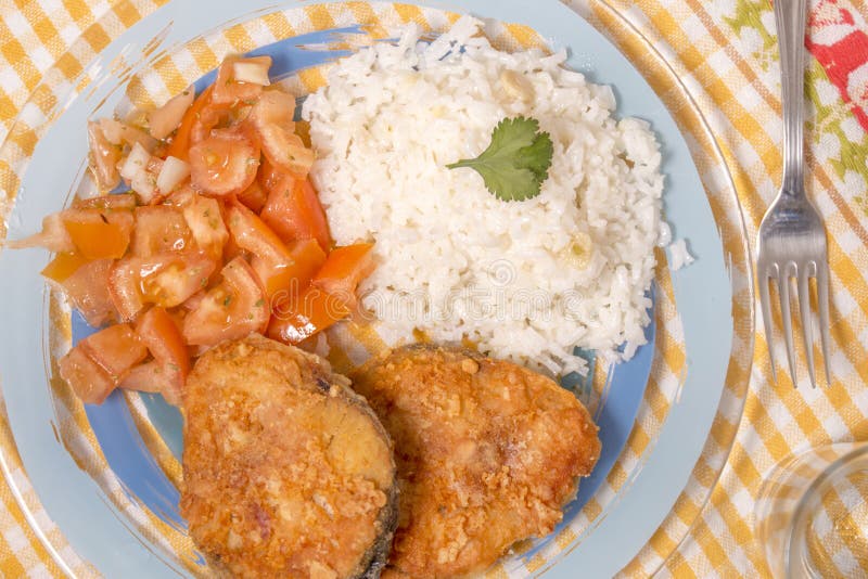 Fried hake fish with rice stock photo. Image of tradition - 111323434