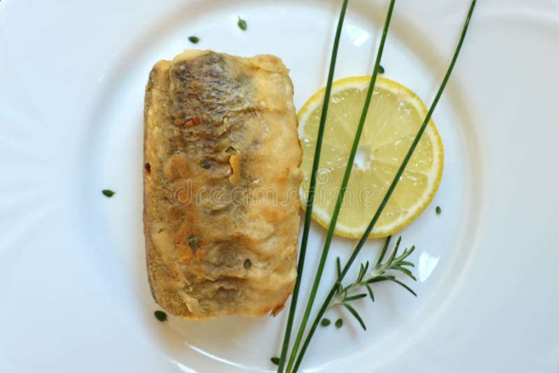 Fried hake on the plate stock image. Image of meal, restaurant - 58177113