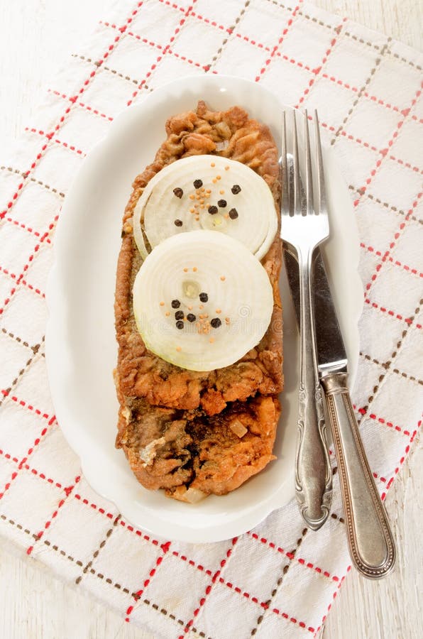 Fried Herringfilet with Onion, Pepper and Mustard Seeds Stock Photo ...