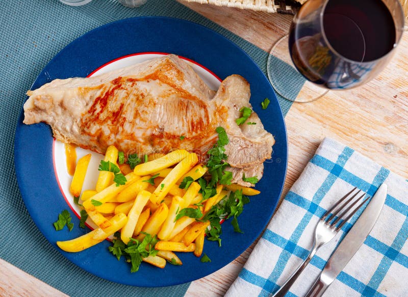 Fried Iberian Pig Served with Potatoes Stock Image - Image of macro ...