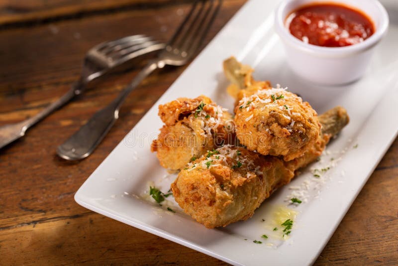 Fried Lamb Chops in Parmesan Batter with Tomato Sauce Stock Image ...