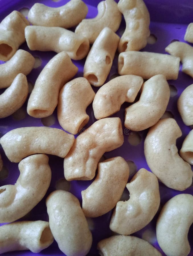 Fried Macaroni Snacks Served on a Purple Plate Stock Image - Image of ...