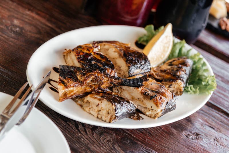 Fried Mackerel Fish Pieces with Lemon. Healthy Fish Stock Image - Image ...