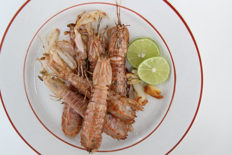 Fried garlic Mantis shrimp stock image. Image of cooked - 33703705
