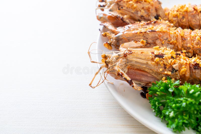 Fried Mantis Shrimp with Garlic Stock Photo - Image of plate, diet ...