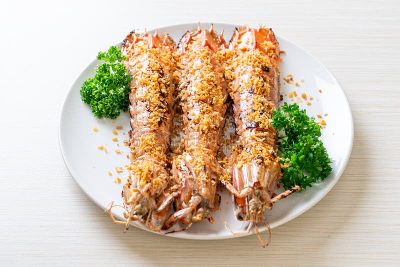 Fried Mantis Shrimp with Garlic Stock Photo - Image of food, meal ...