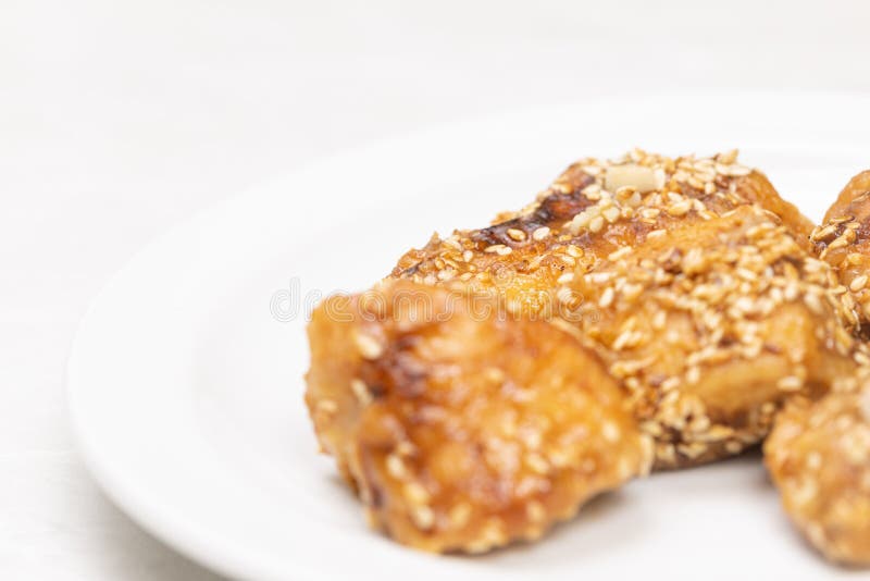 Fried Marinated Chicken White Meat on the White Plate Stock Photo ...