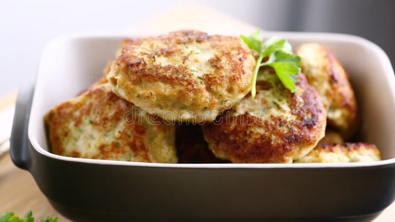 Fried Meat Cutlets in a Ceramic Form on a Wooden Table Stock Footage ...