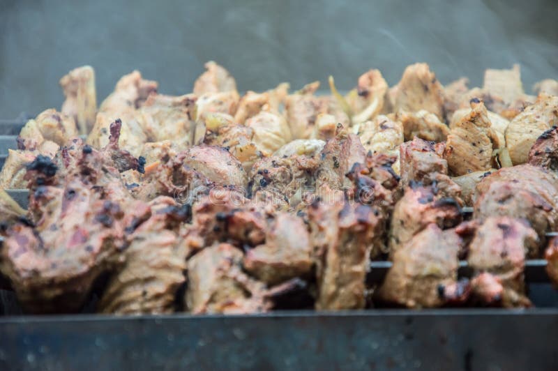 Fried meat on the fire stock photo. Image of cooking - 149863612