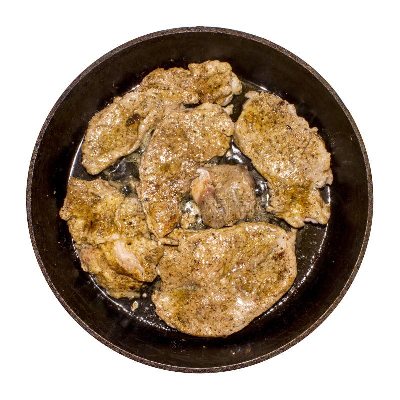 Fried Meat in a Frying Pan.Roast Pork in a Frying Pan on a White ...