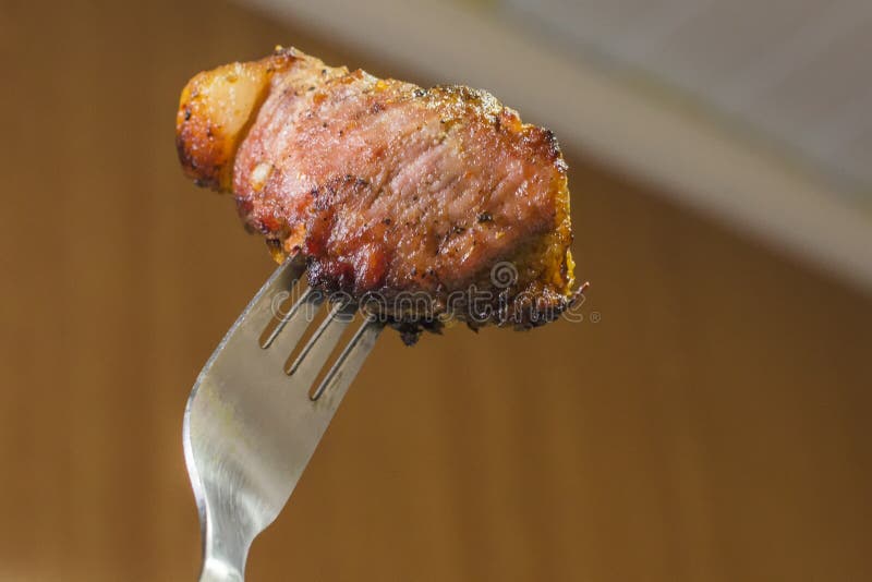 Fried Meat on a Light Background. Barbecue on the Fork Stock Photo ...