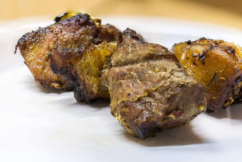 Fried Meat on a Light Background. Barbecue on the Plate Stock Photo ...