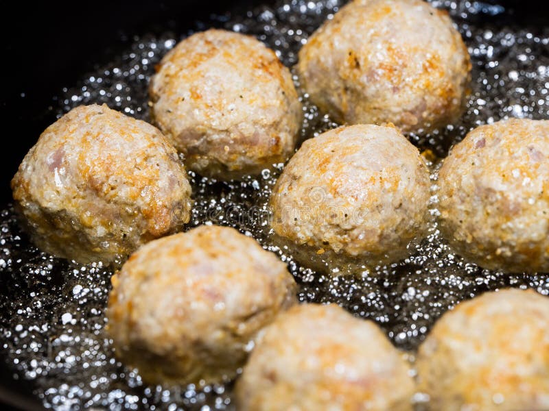 Fried meatballs in a pan stock image. Image of meatballs - 303666841