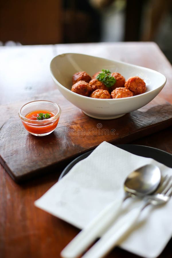 Fried Meetball with Red Sauce on the Table in Restaurant Stock Image ...