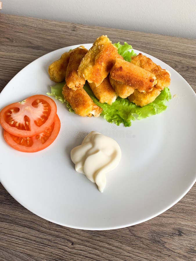Fried Mozzarella Cheese Sticks Breaded on White Plate Stock Image ...