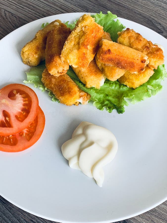 Fried Mozzarella Cheese Sticks Breaded on White Plate Stock Image ...