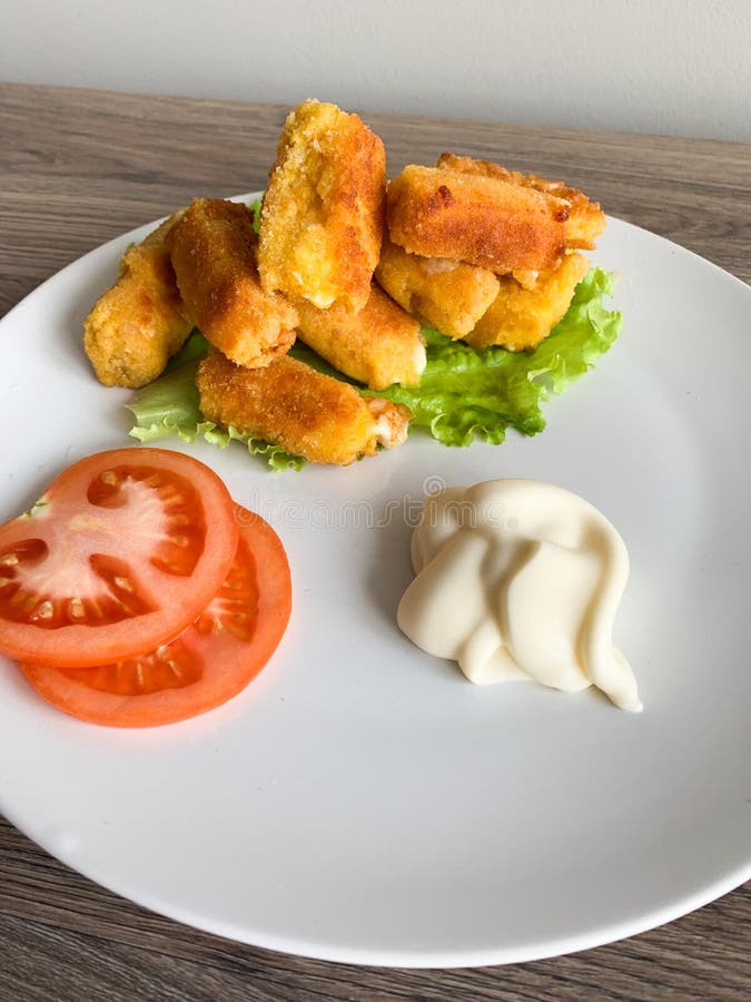 Fried Mozzarella Cheese Sticks Breaded on White Plate Stock Photo ...