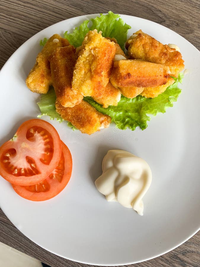 Fried Mozzarella Cheese Sticks Breaded on White Plate Stock Photo ...